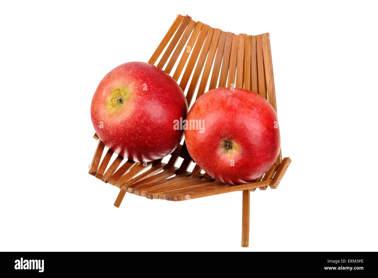 two red apple in a basket isolated Stock Photo - Alamy