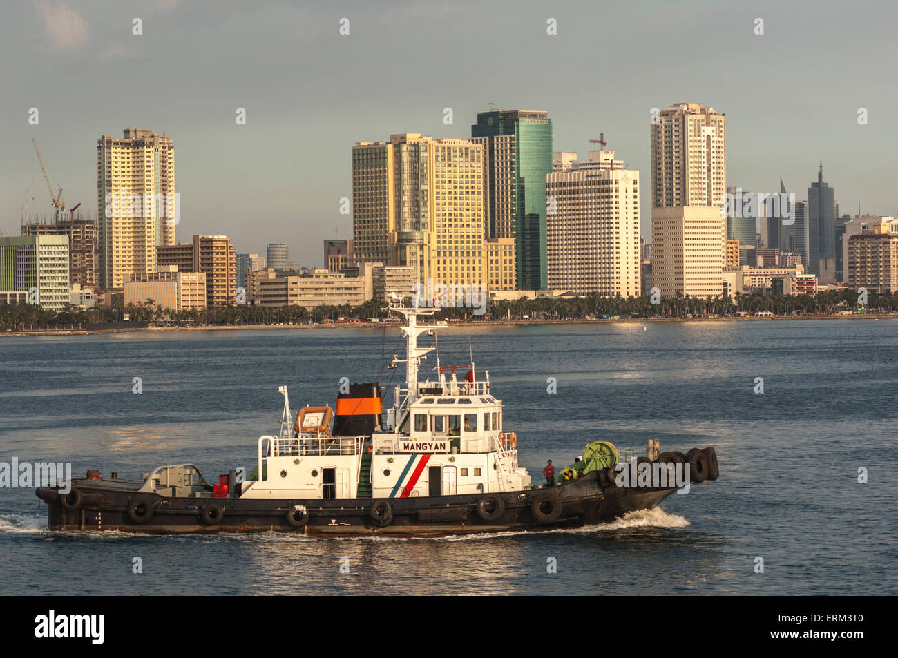 Skyline and port of Manila taken from the sea Stock Photo - Alamy