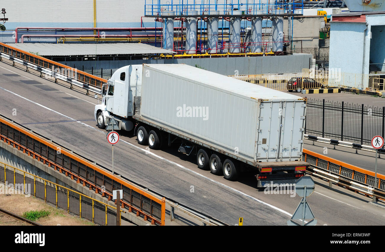 Transportation of cargoes in containers by lorry Stock Photo - Alamy