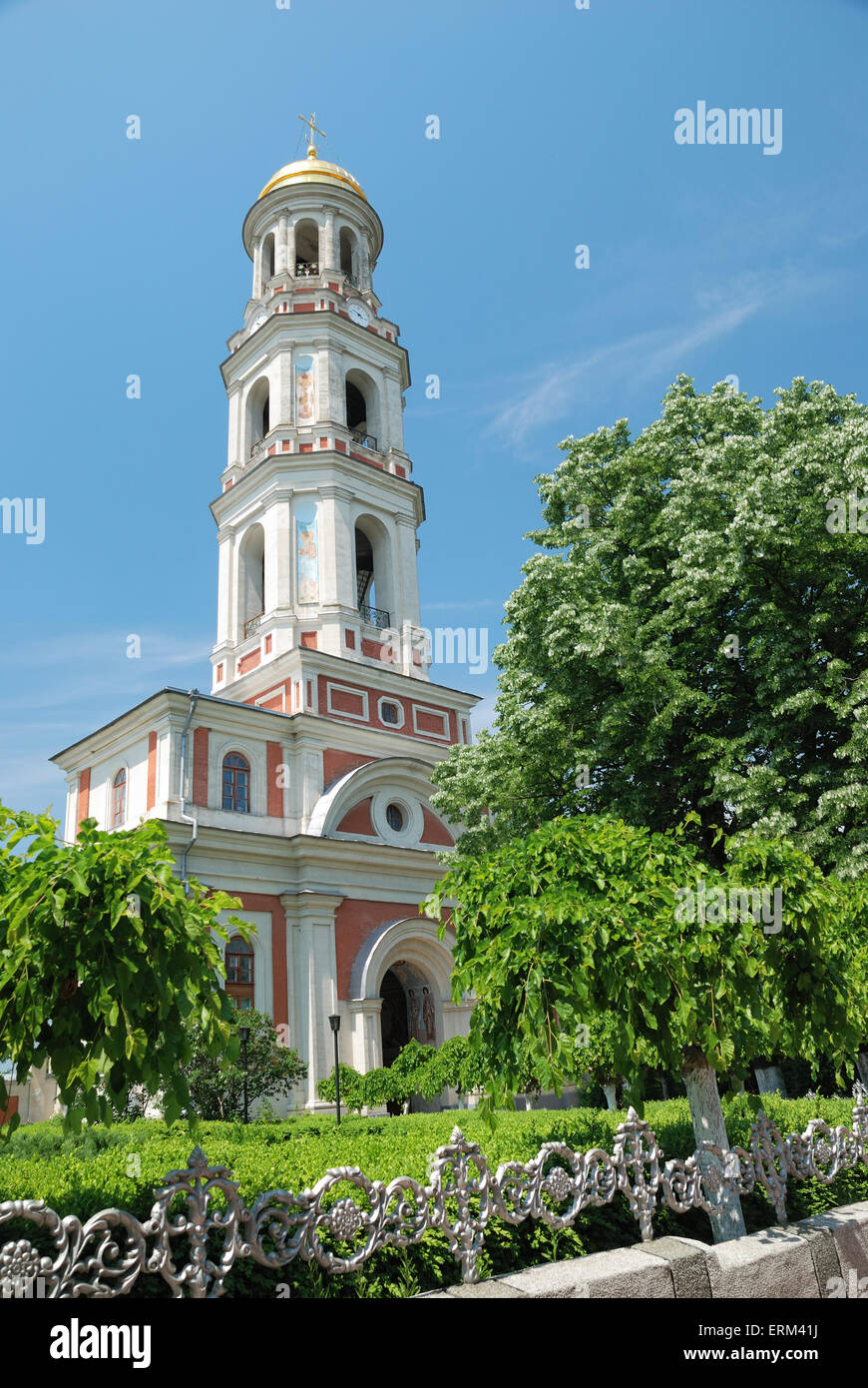 the church bell tower and garden trees Stock Photo - Alamy