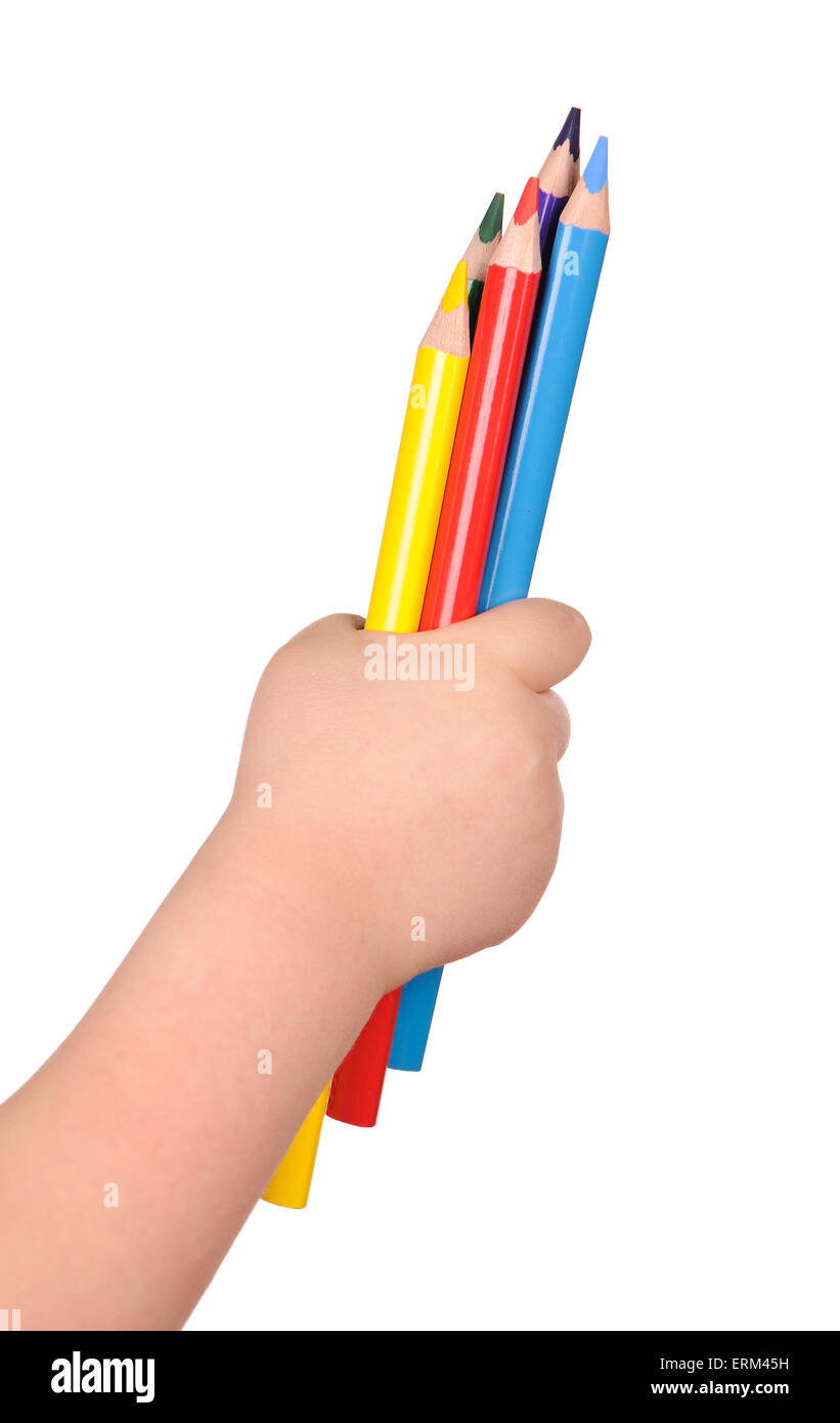 Children's hand holds the colorful pencils. isolated Stock Photo - Alamy