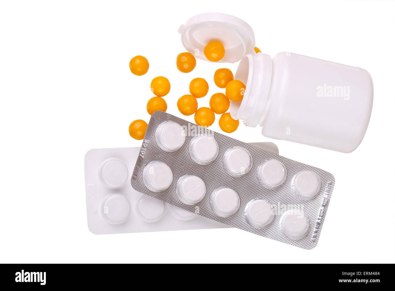 Tablets and vitamins isolated on white Stock Photo - Alamy