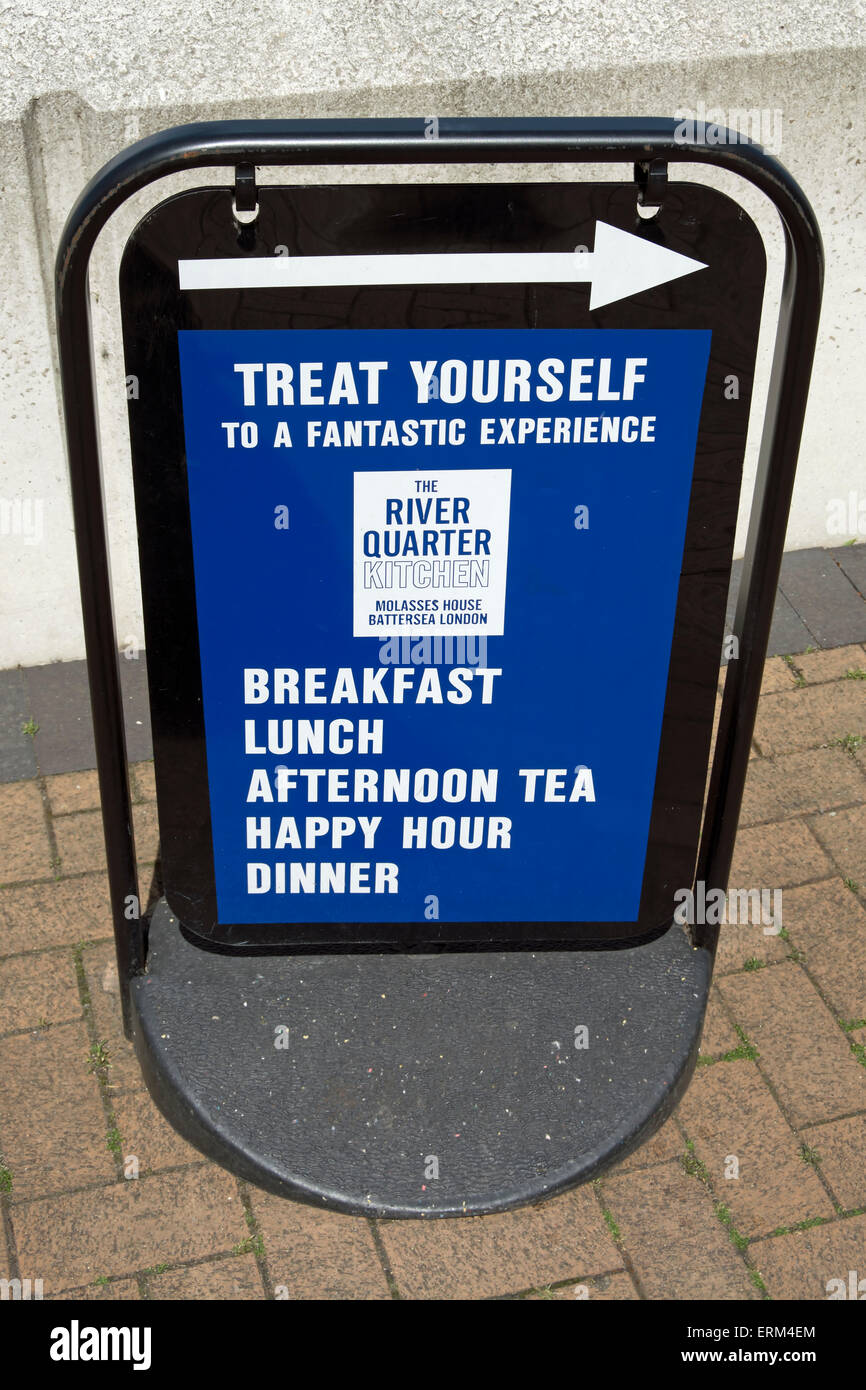 street sign for a restaurant offering breakfast, lunch, dinner, happy ...