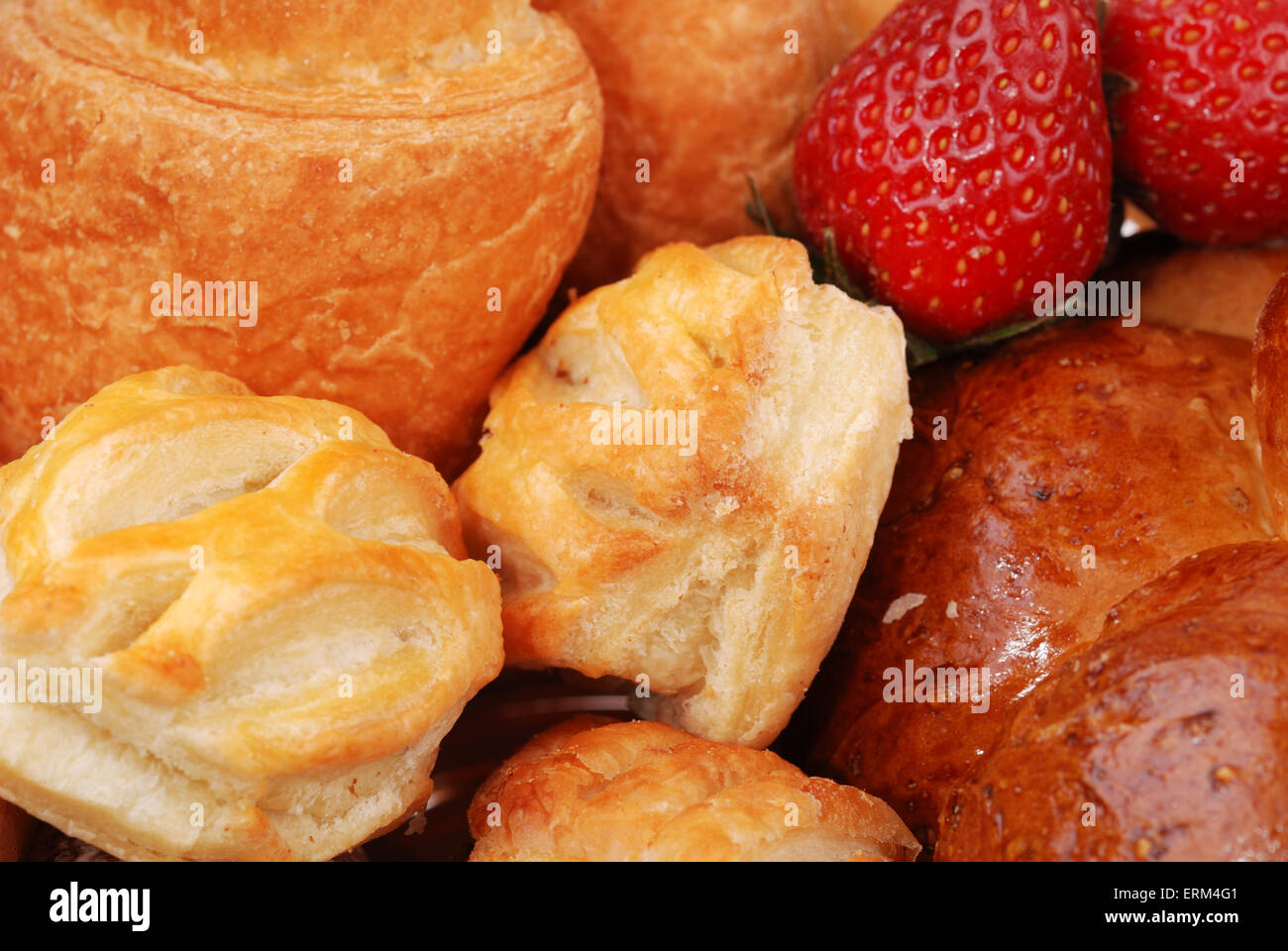 Background from various buns and strawberry Stock Photo - Alamy