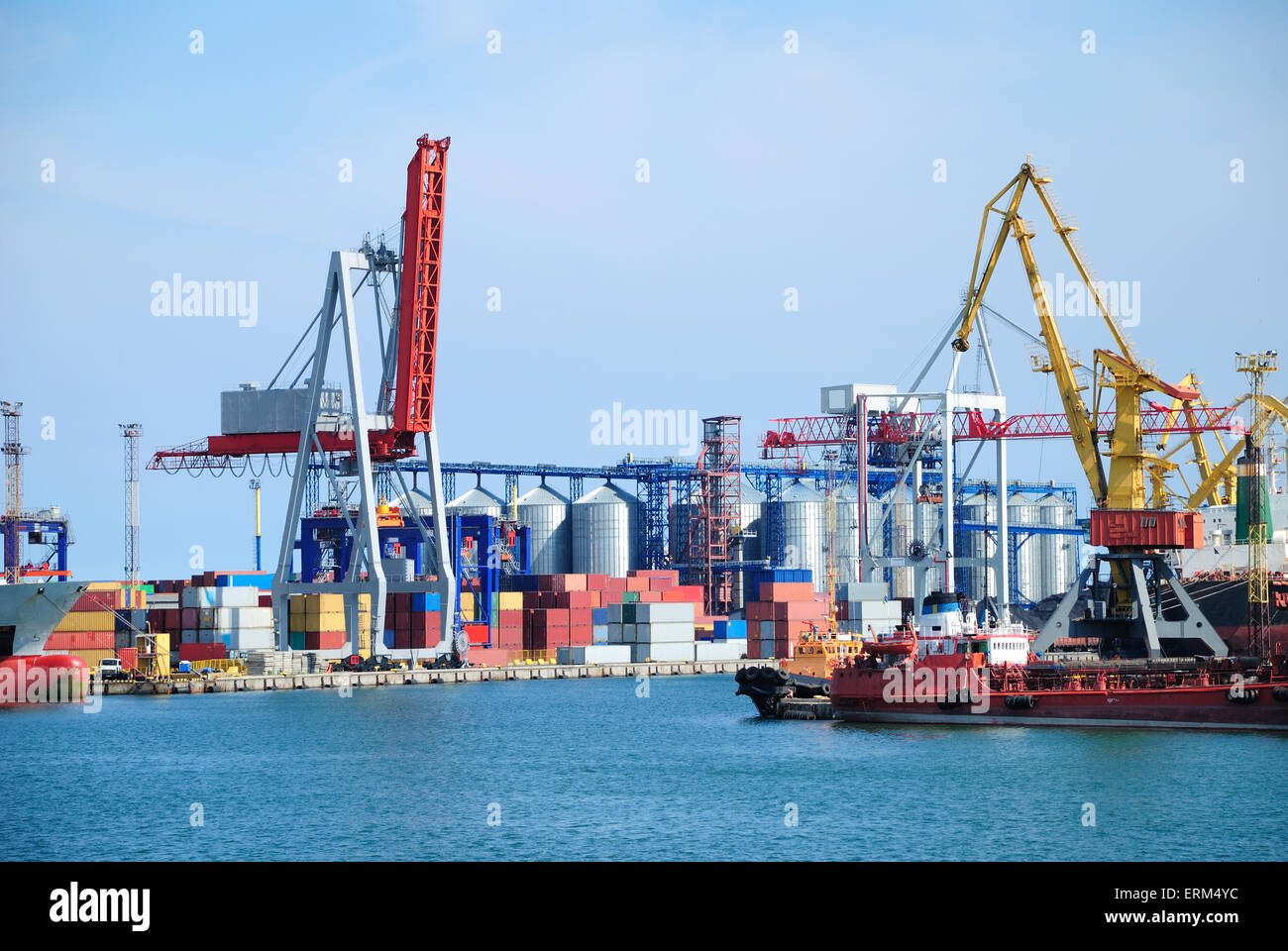 View on trading seaport with cranes, cargoes and the ship Stock Photo ...