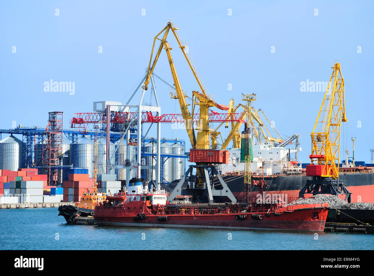 View on trading seaport with cranes, cargoes and the ship Stock Photo ...