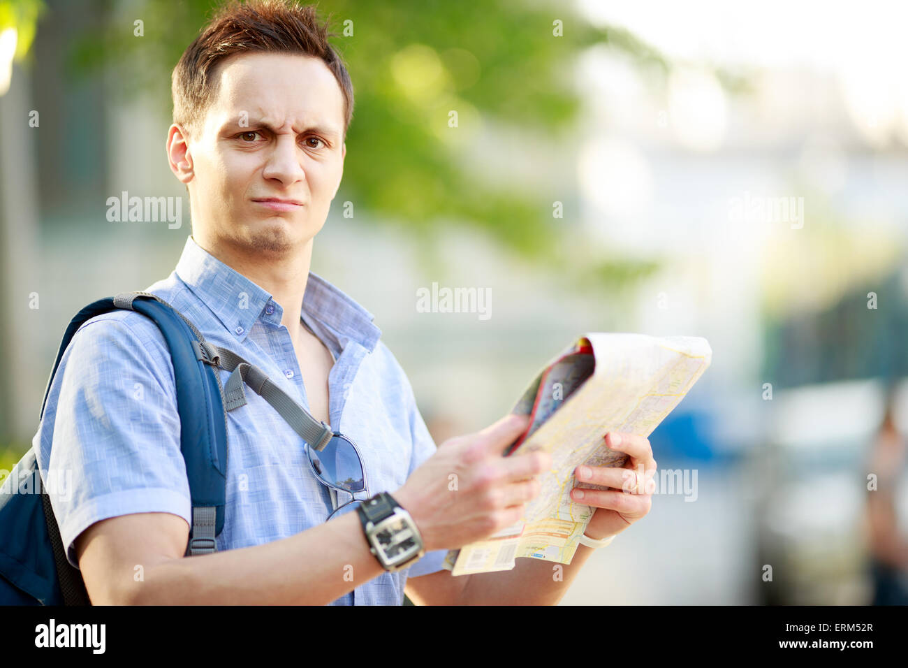Confused man map hi-res stock photography and images - Alamy