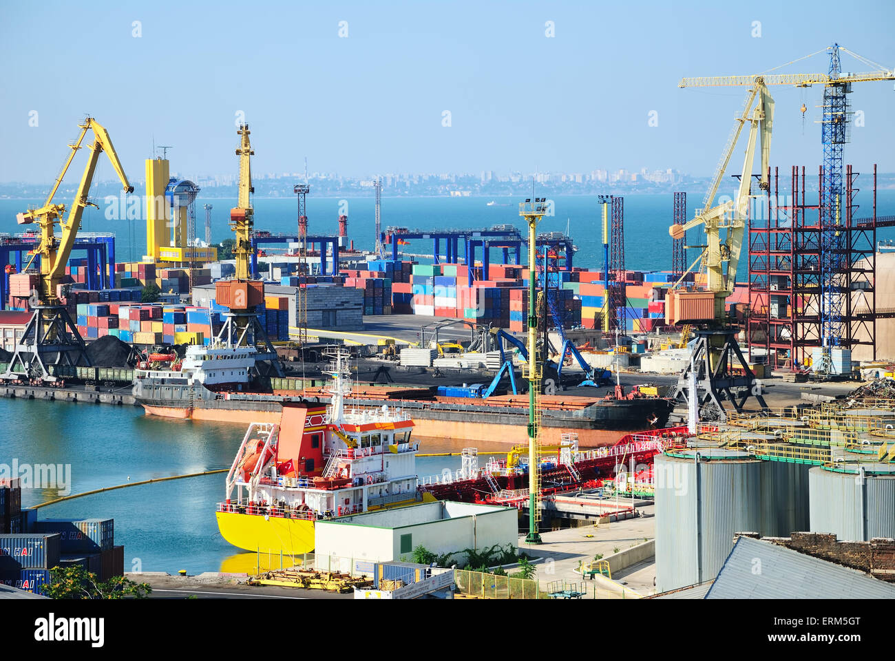 Port warehouse with containers and industrial cargoes Stock Photo - Alamy