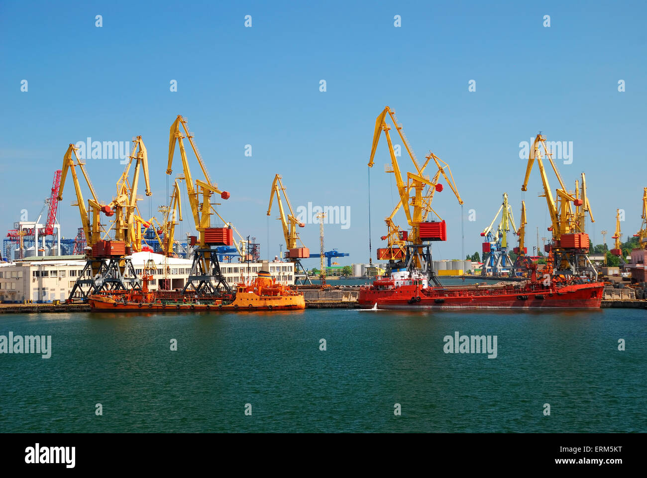 View on trading seaport with cranes, cargoes and the ship Stock Photo ...