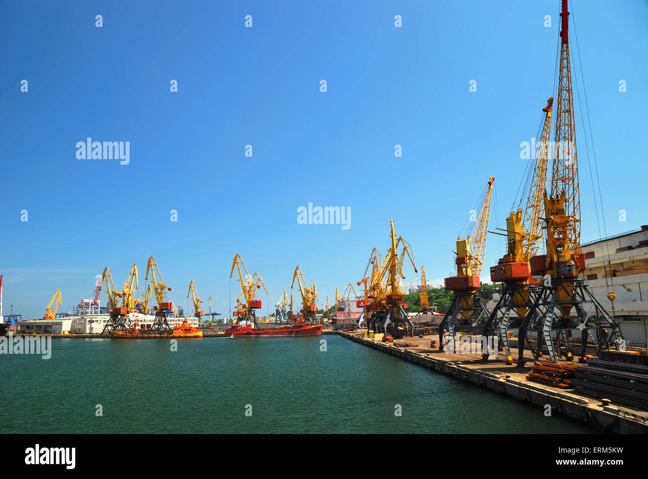 View on trading seaport with cranes, cargoes and the ship Stock Photo ...