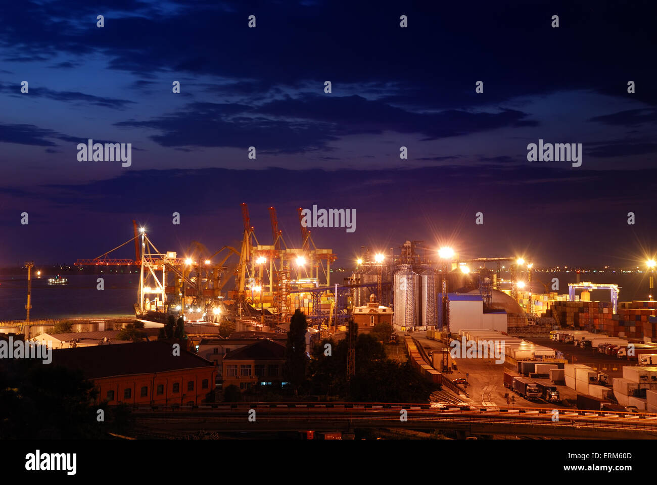 Port warehouse with containers and industrial cargoes Stock Photo - Alamy