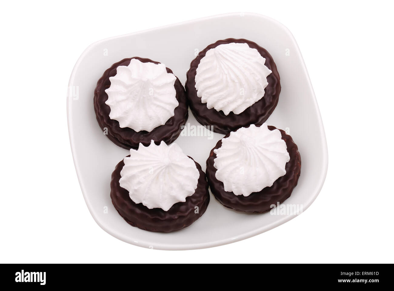 Plate with a white zephyr isolated on white Stock Photo - Alamy
