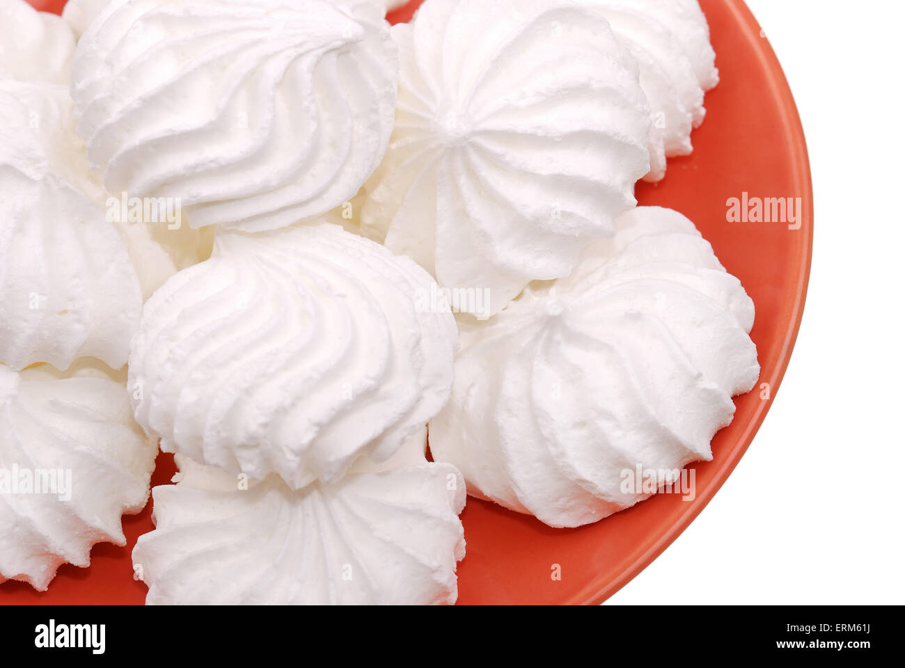 Plate with a white zephyr isolated on white Stock Photo - Alamy