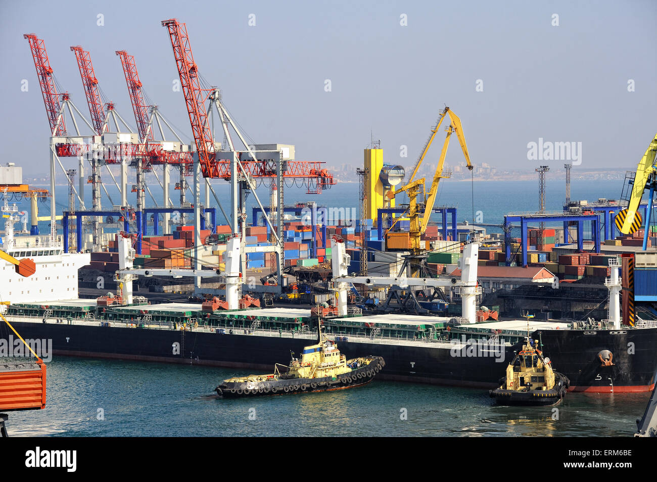cargo ship in industrial port Stock Photo - Alamy