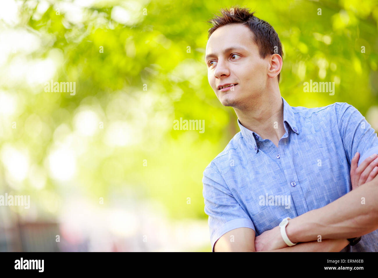 Young man outdoors portrait Stock Photo - Alamy