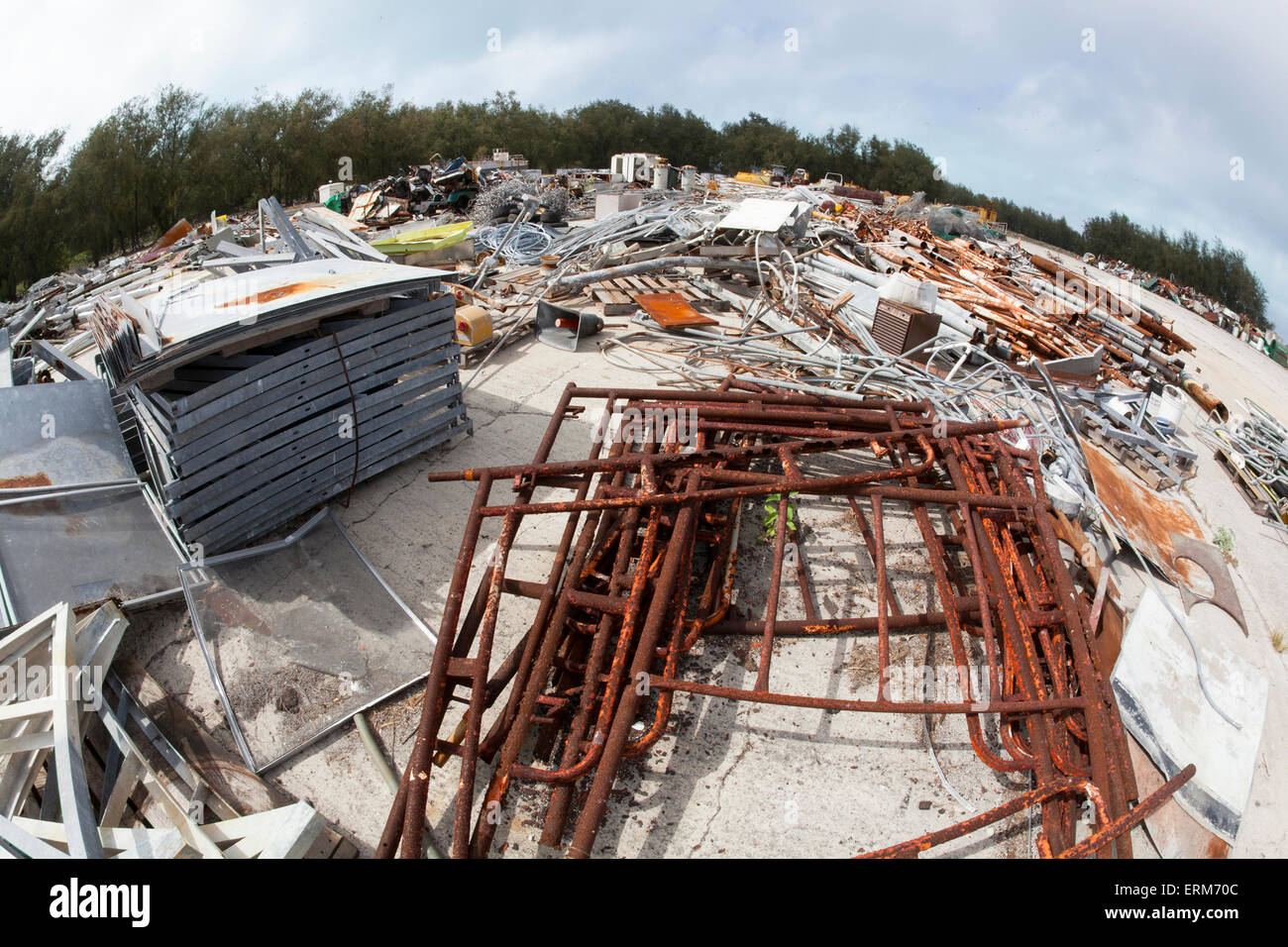Junkyard of discarded items to be cut up and shipped off a remote North ...