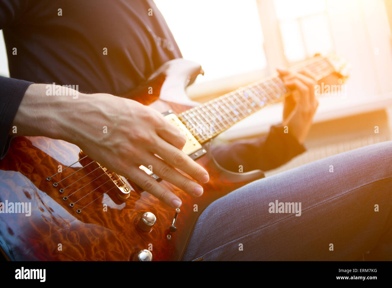 Electric guitar player Stock Photo - Alamy