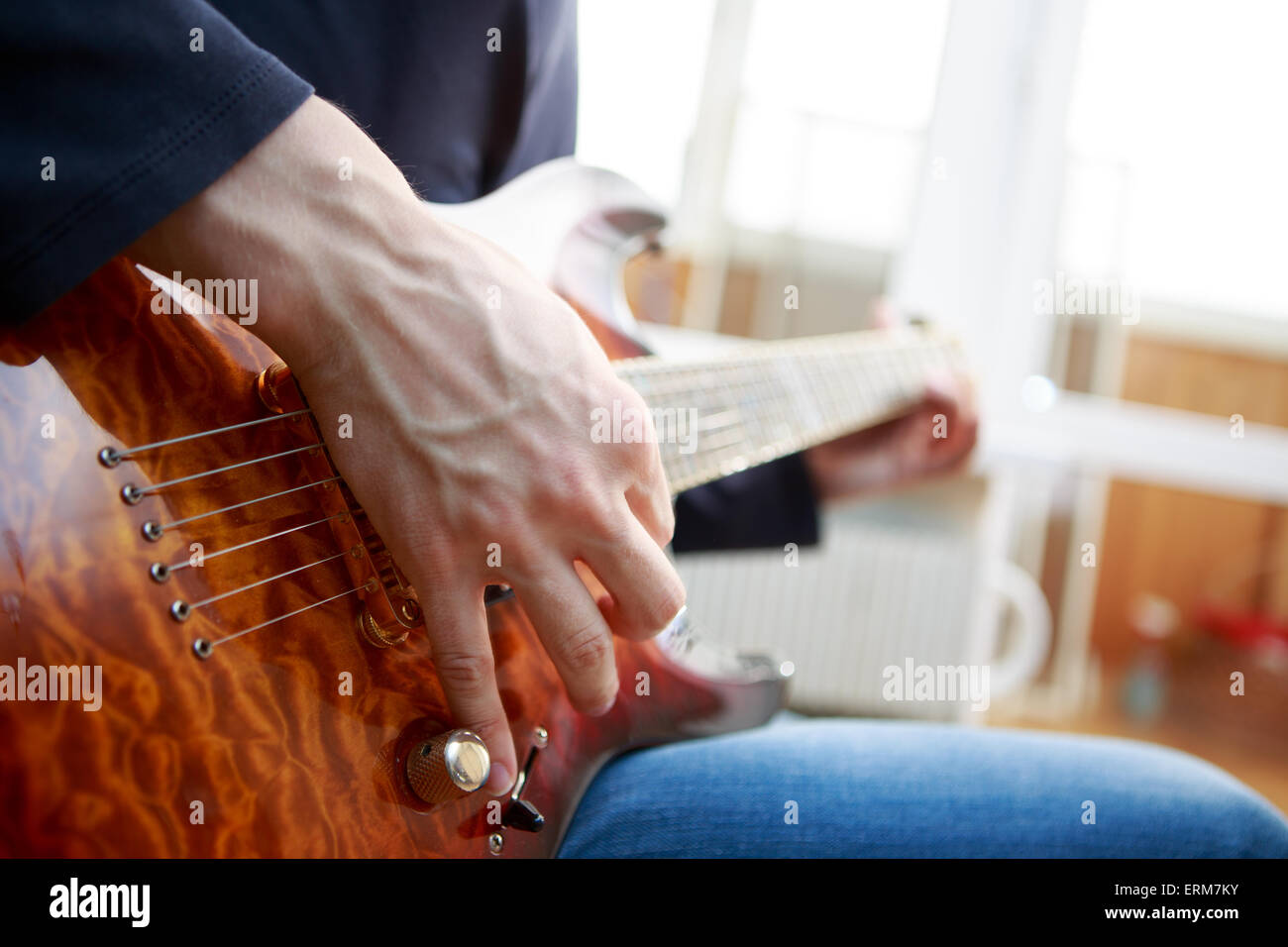 Electric guitar player Stock Photo - Alamy