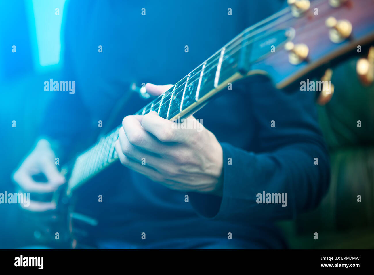 Electric guitar player Stock Photo - Alamy
