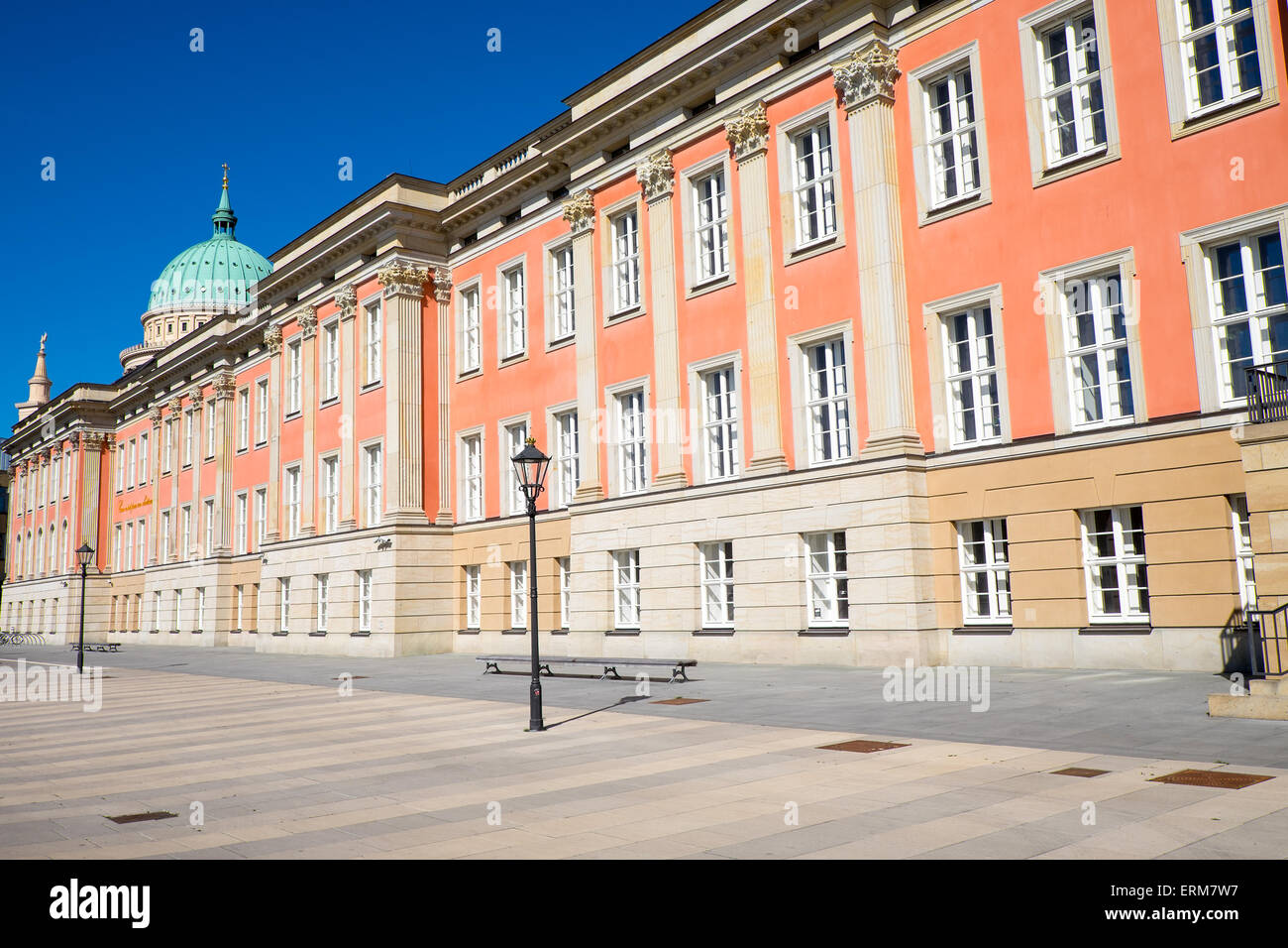 The rebuilt City Palace in Potsdam with the St. Nicolas church in the ...