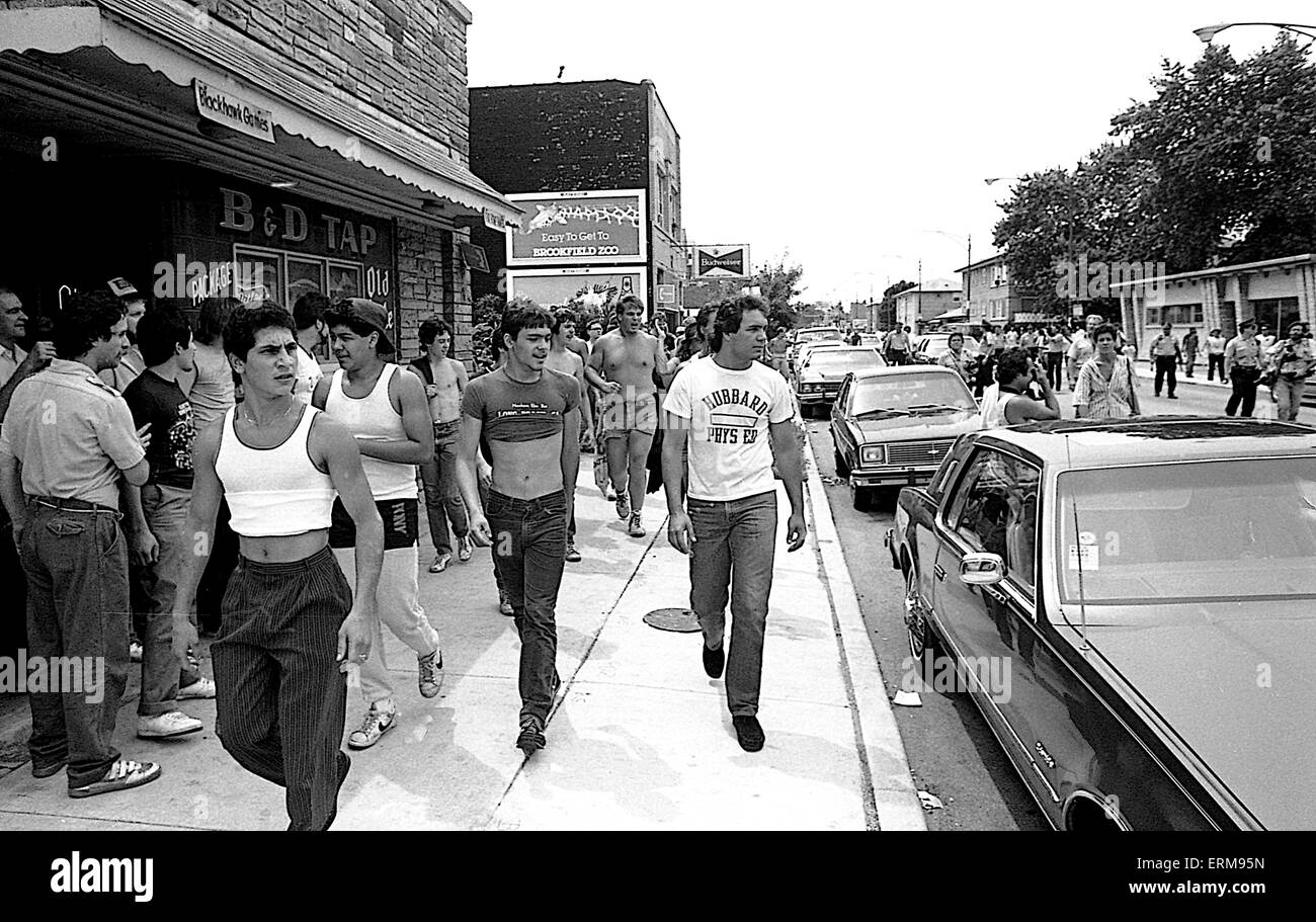 Chicago, Illinois 6-28-1986 Groups of local white jeer at a group of ...