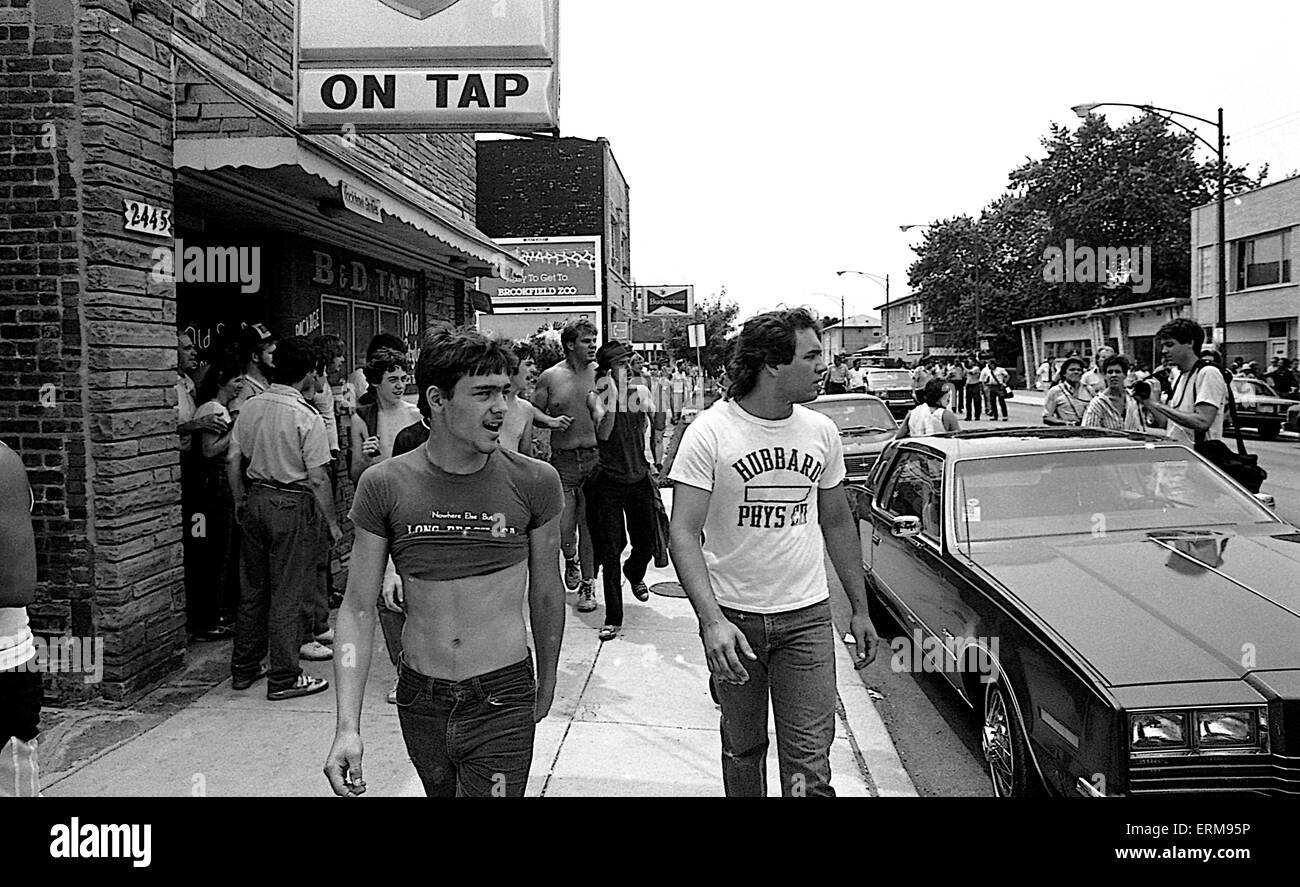 Chicago, Illinois 6-28-1986 Groups of local white jeer at a group of ...