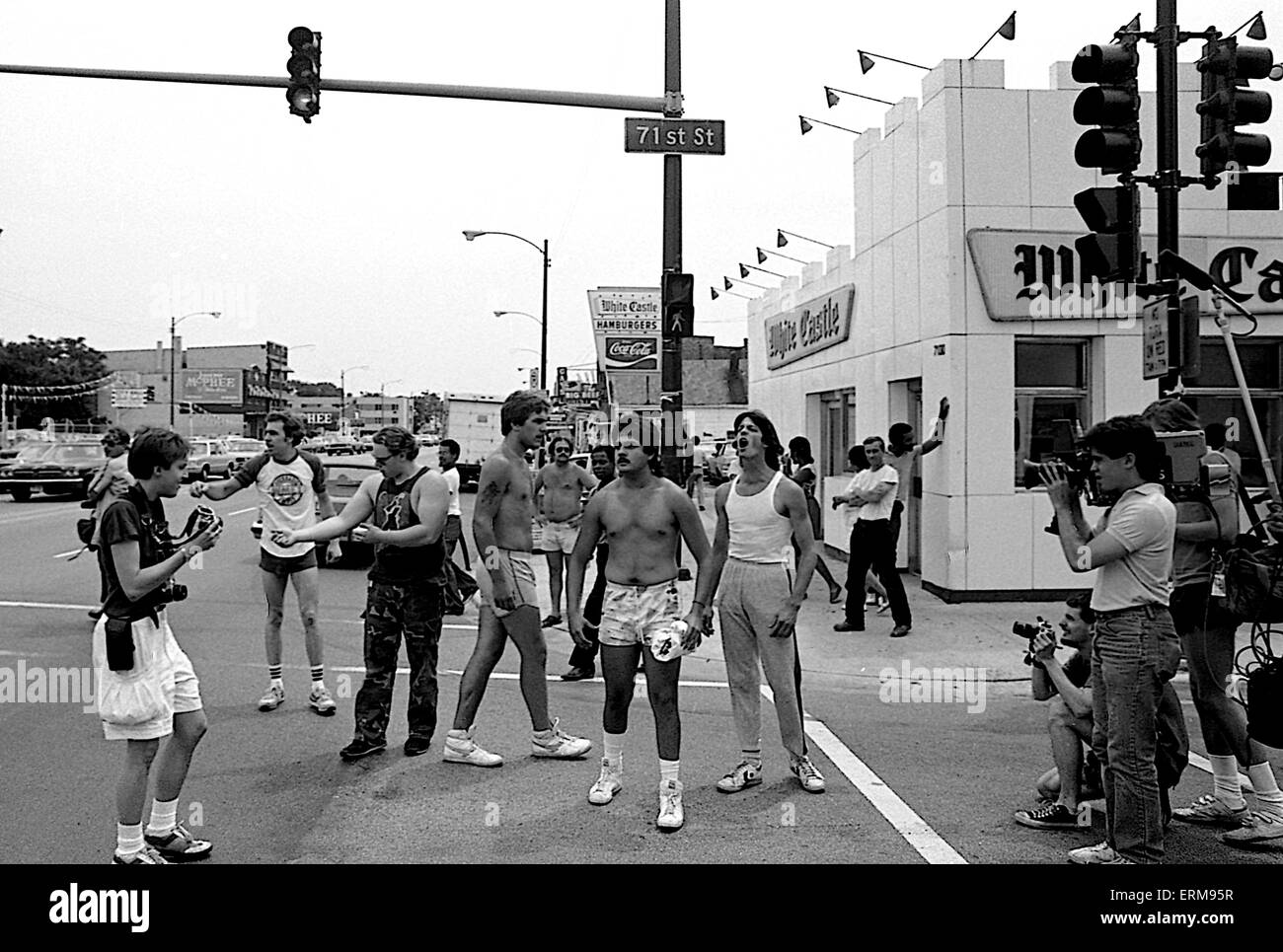 Chicago, Illinois 6-28-1986 Groups of local white jeer at a group of ...