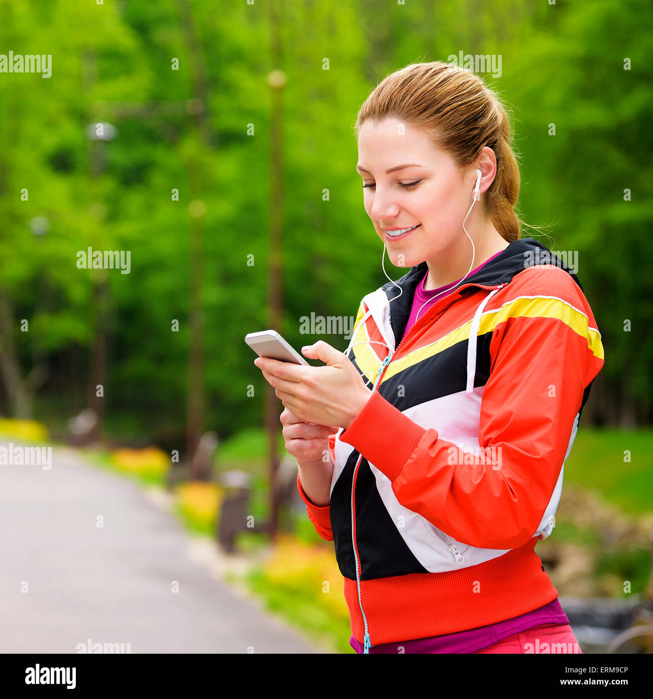 Lady running on a park Stock Photo - Alamy