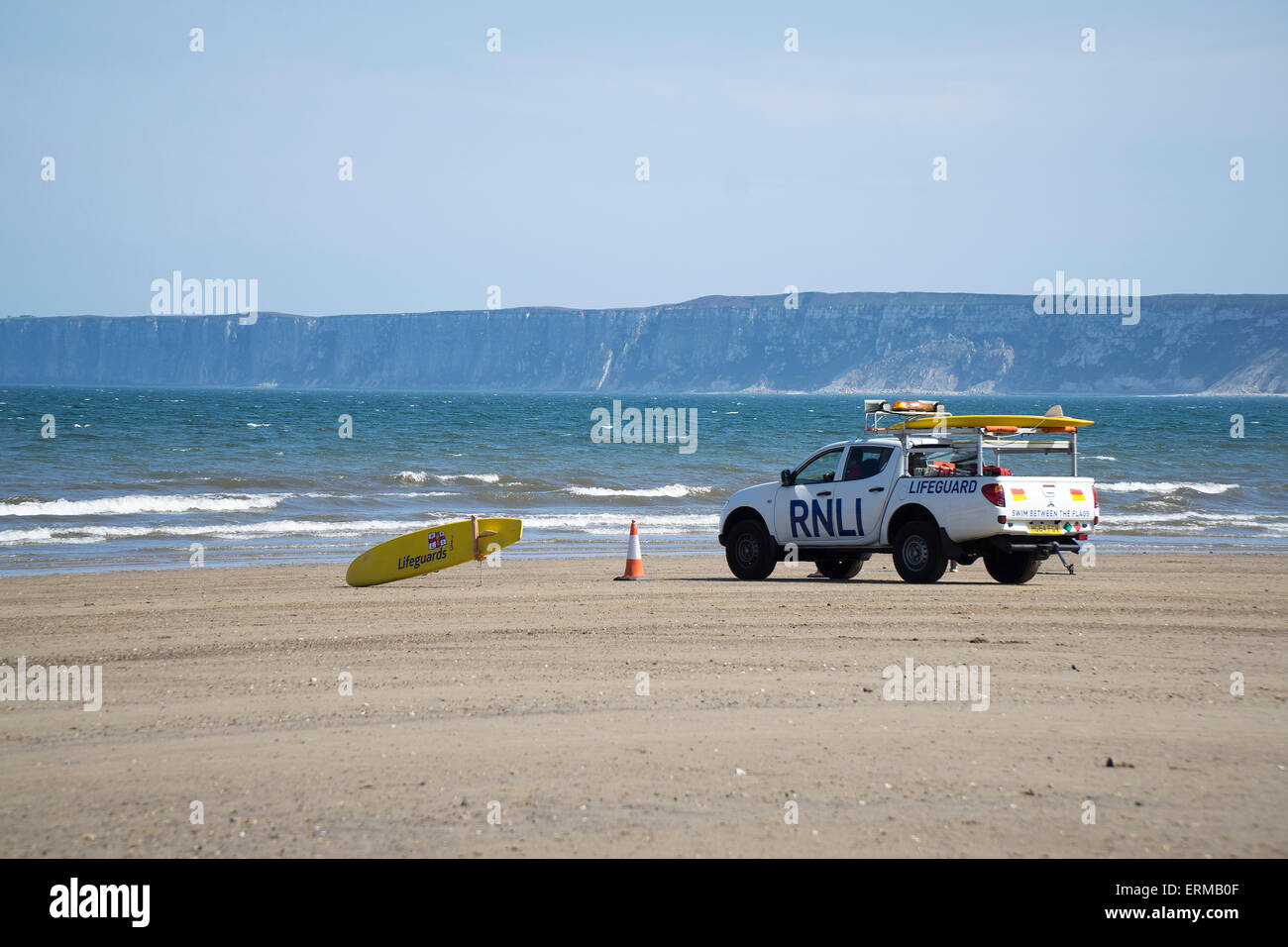Rnli Patrol on beach at filey North Yorkshire Stock Photo - Alamy