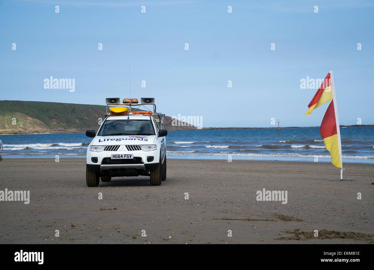 Rnli Patrol on beach at filey North Yorkshire Stock Photo - Alamy