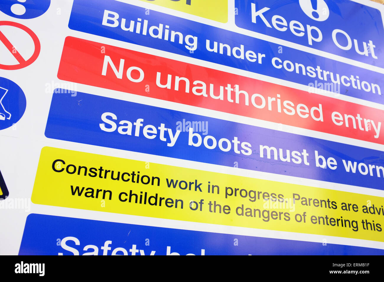 A safety warning sign on the outside of a construction site in Bristol ...