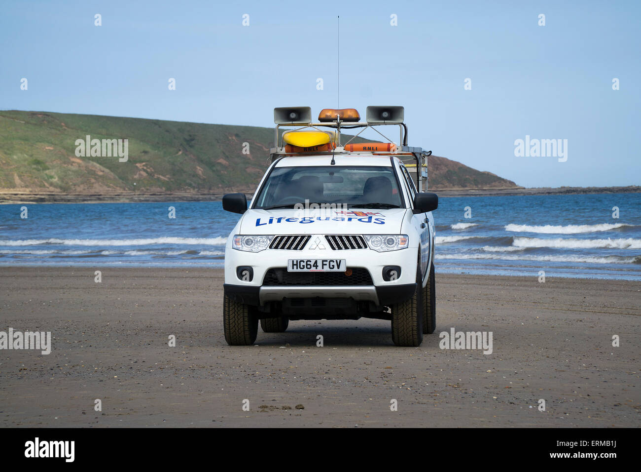 Rnli Patrol on beach at filey North Yorkshire Stock Photo - Alamy