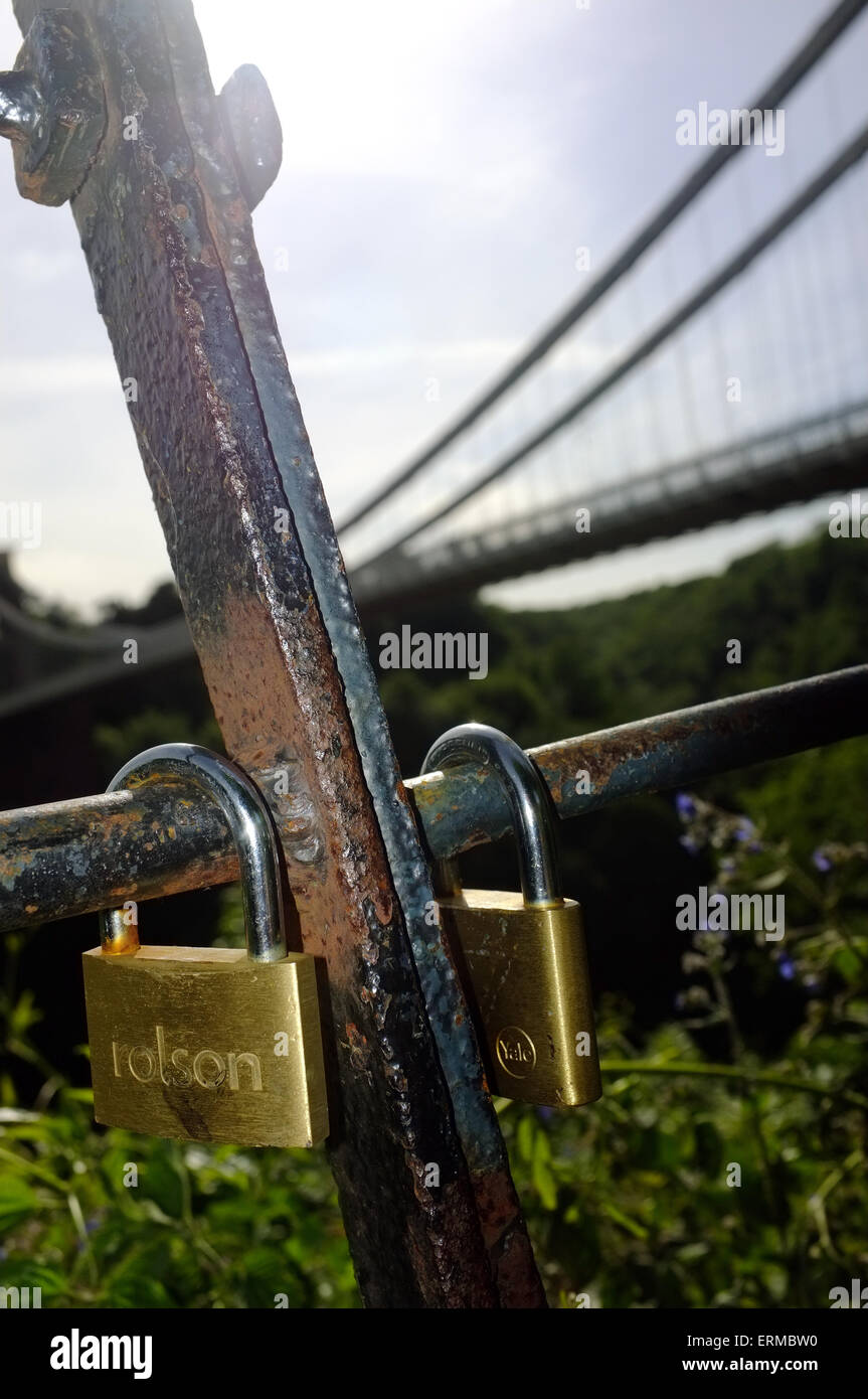 Two love locks attached to a railings with the Clifton Suspension ...