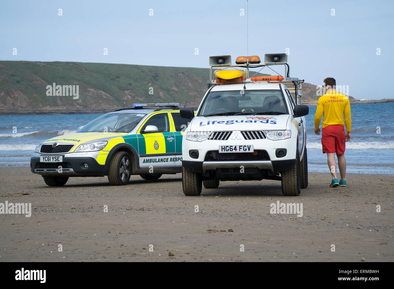 RNLI Lifeguard and Ambulance Service Paramedic in training excercise ...