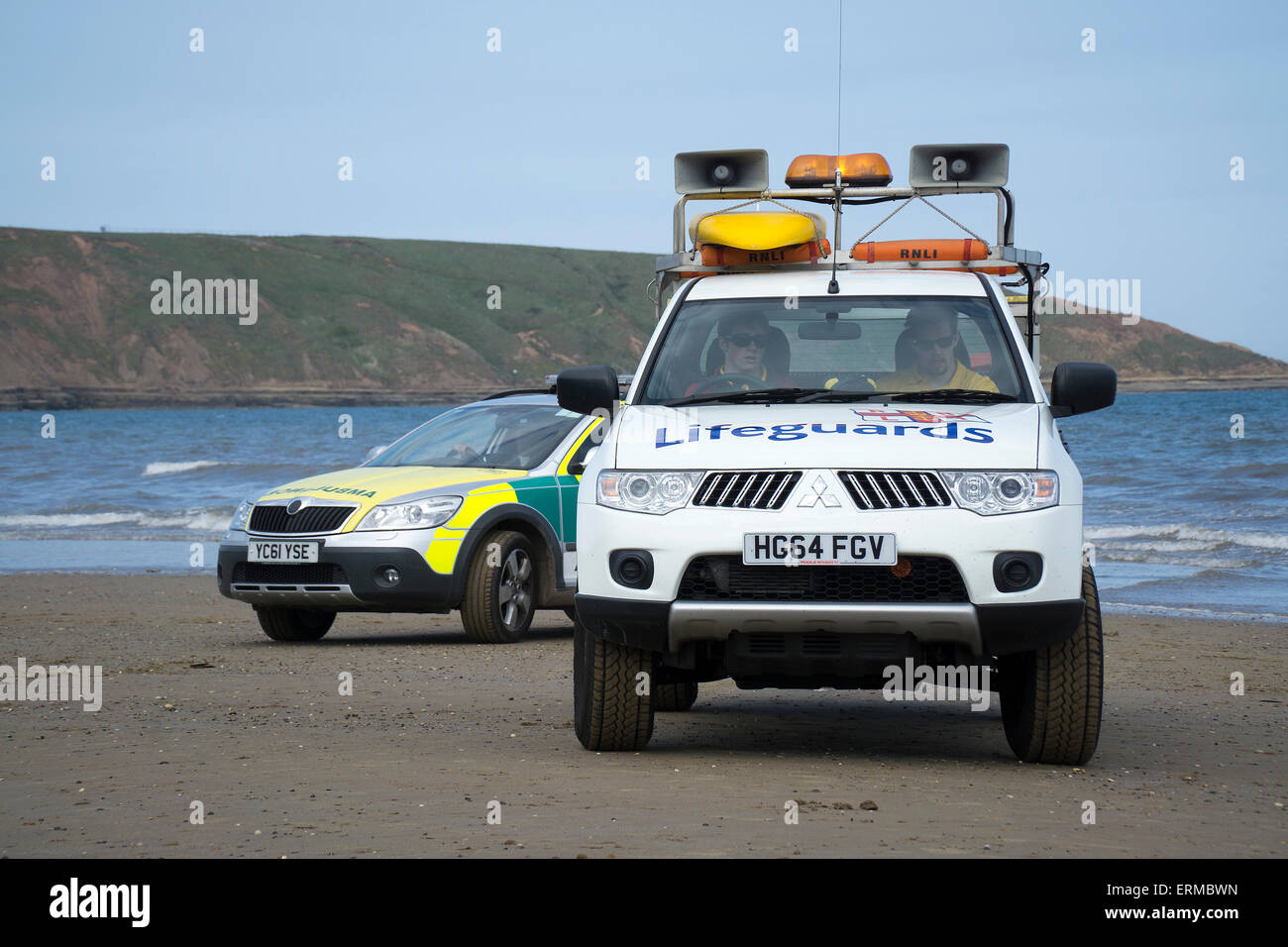 RNLI Lifeguard and Ambulance Service Paramedic in training excercise ...