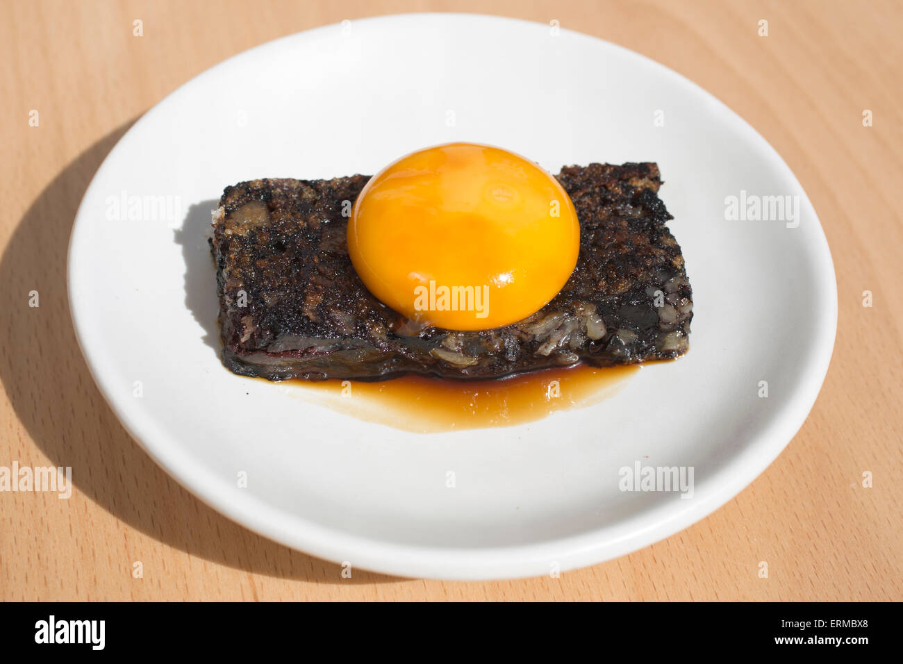 Pig blood cake with egg yolk on top, BAO London, Taiwanese restaurant ...