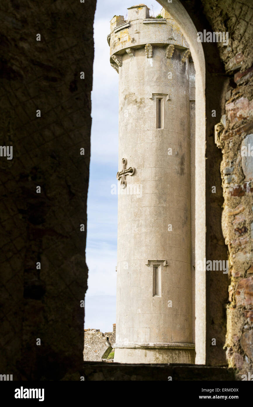 Castle turret framed in large window of stone wall; Clifden, County ...