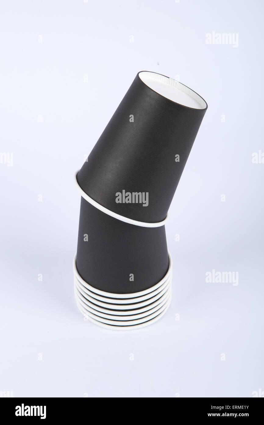 Close up front view of recycled black upside down paper glasses ...