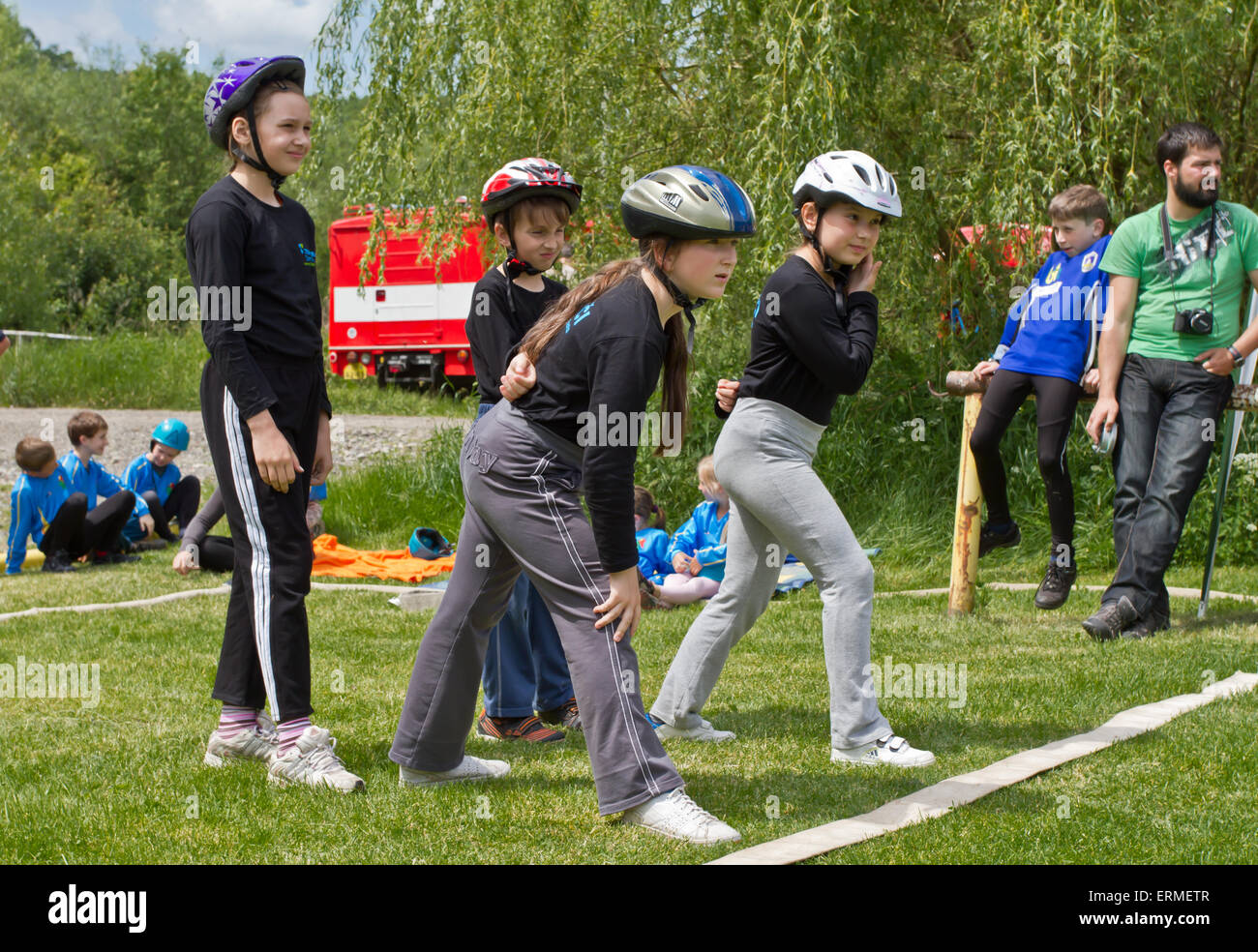 Group of five kids playing soccer hi-res stock photography and images ...