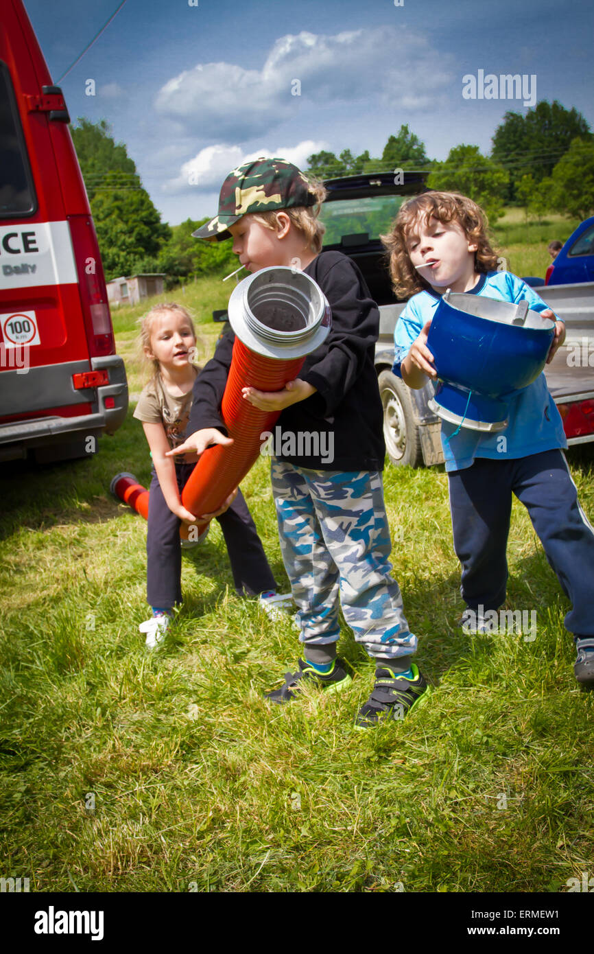 Volunteer firefighters training children Stock Photo - Alamy
