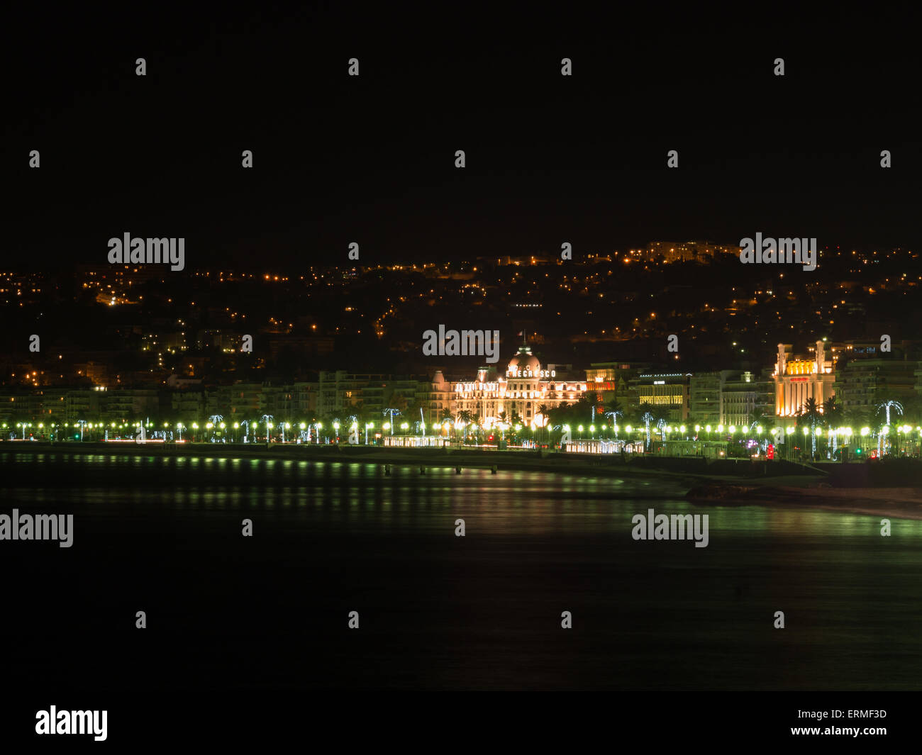 Nice seafront promenade lights reflecting in the sea at night Stock ...