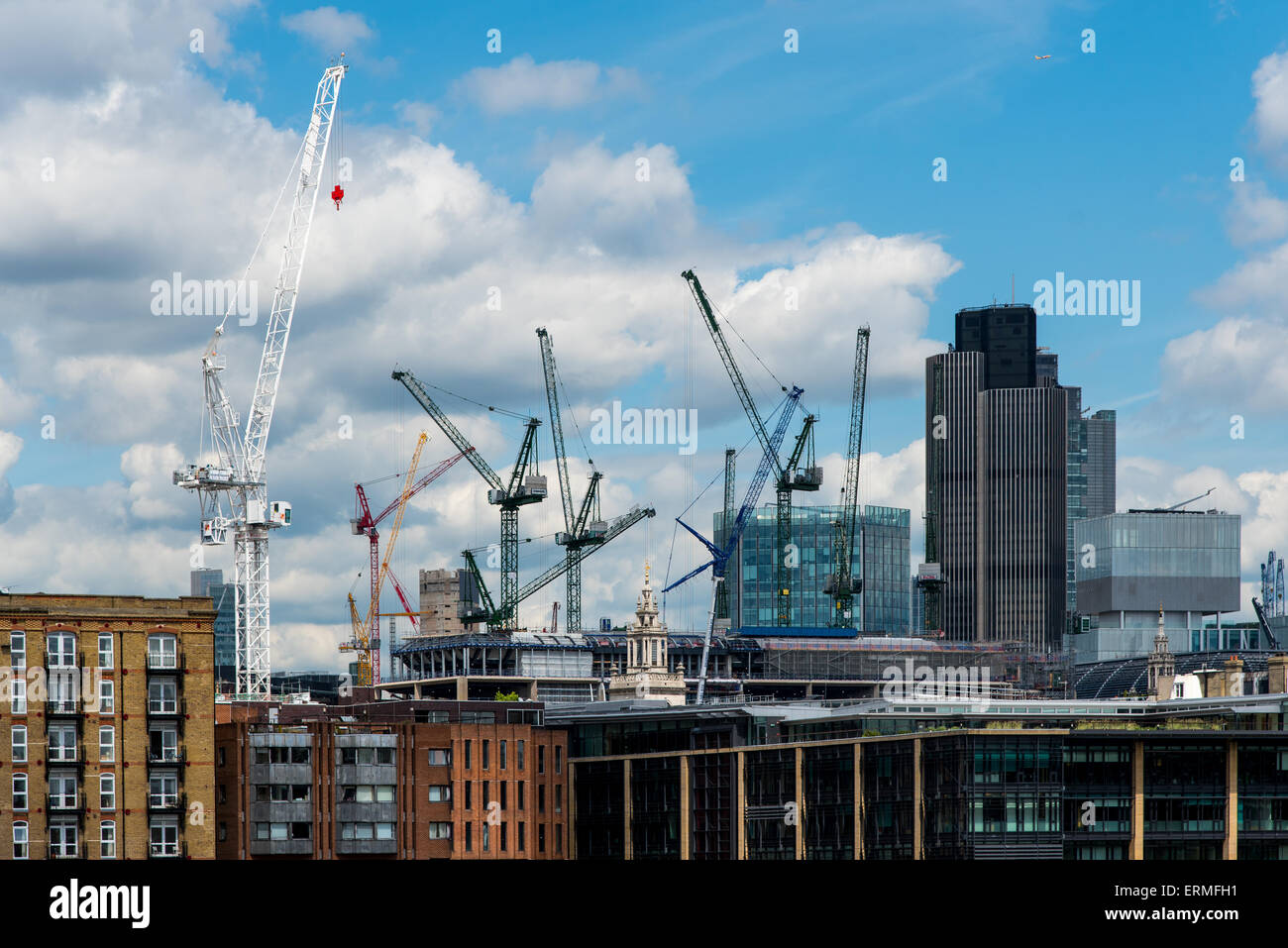 A large number of cranes suggest a building boom in the City of London ...
