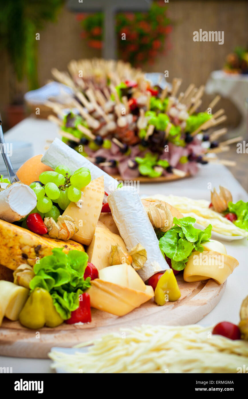 Catering food decorated on table Stock Photo - Alamy