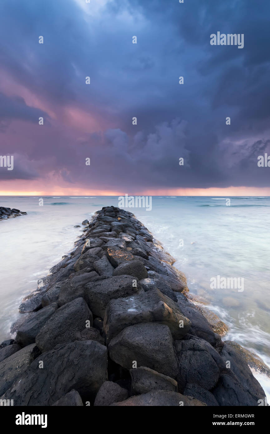 Sunrise in Kapaa looking out over breakwater; Kapaa, Kauai, Hawaii ...