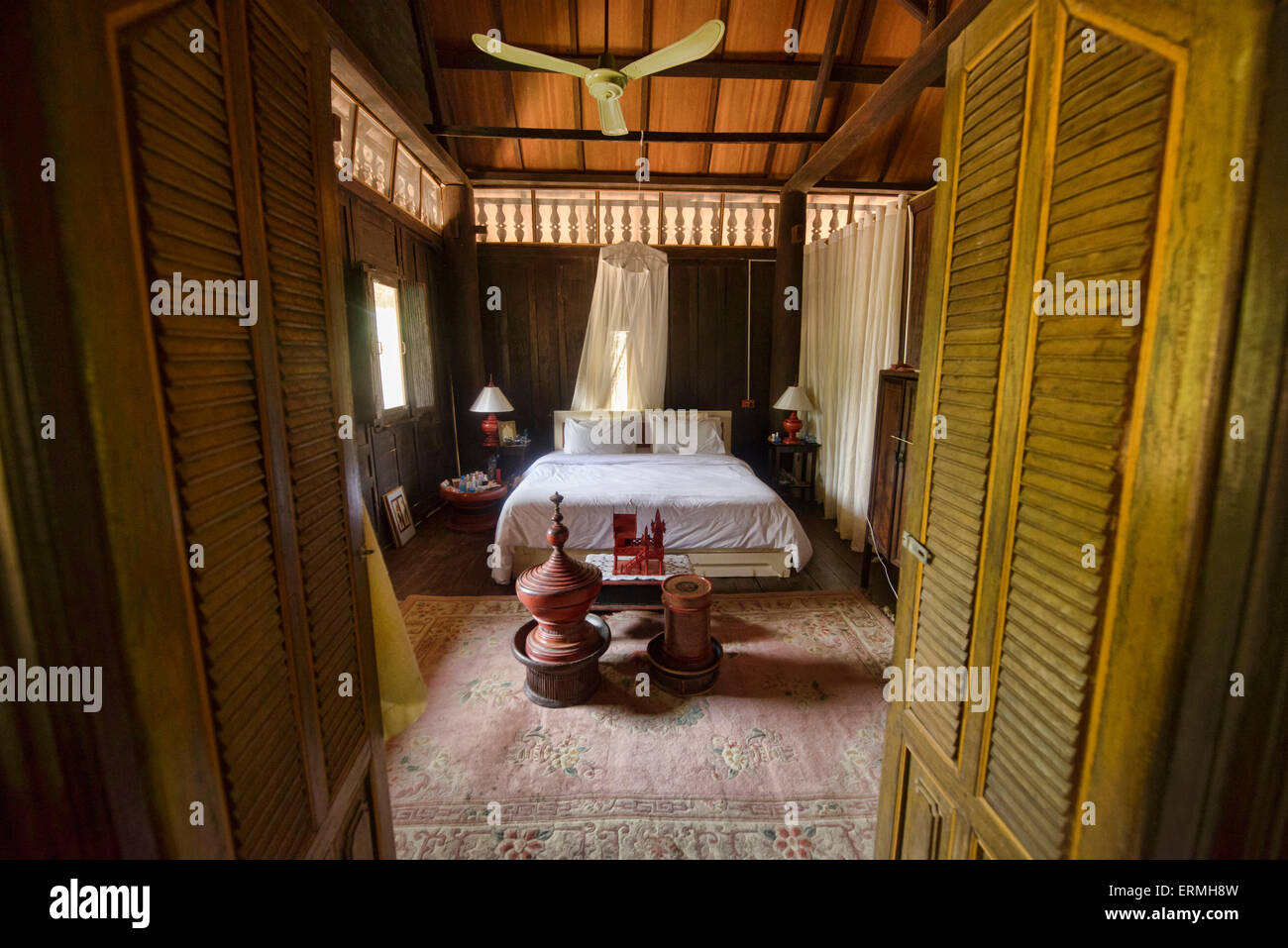 bedroom in a traditional teak house, Champasak, Laos Stock Photo - Alamy