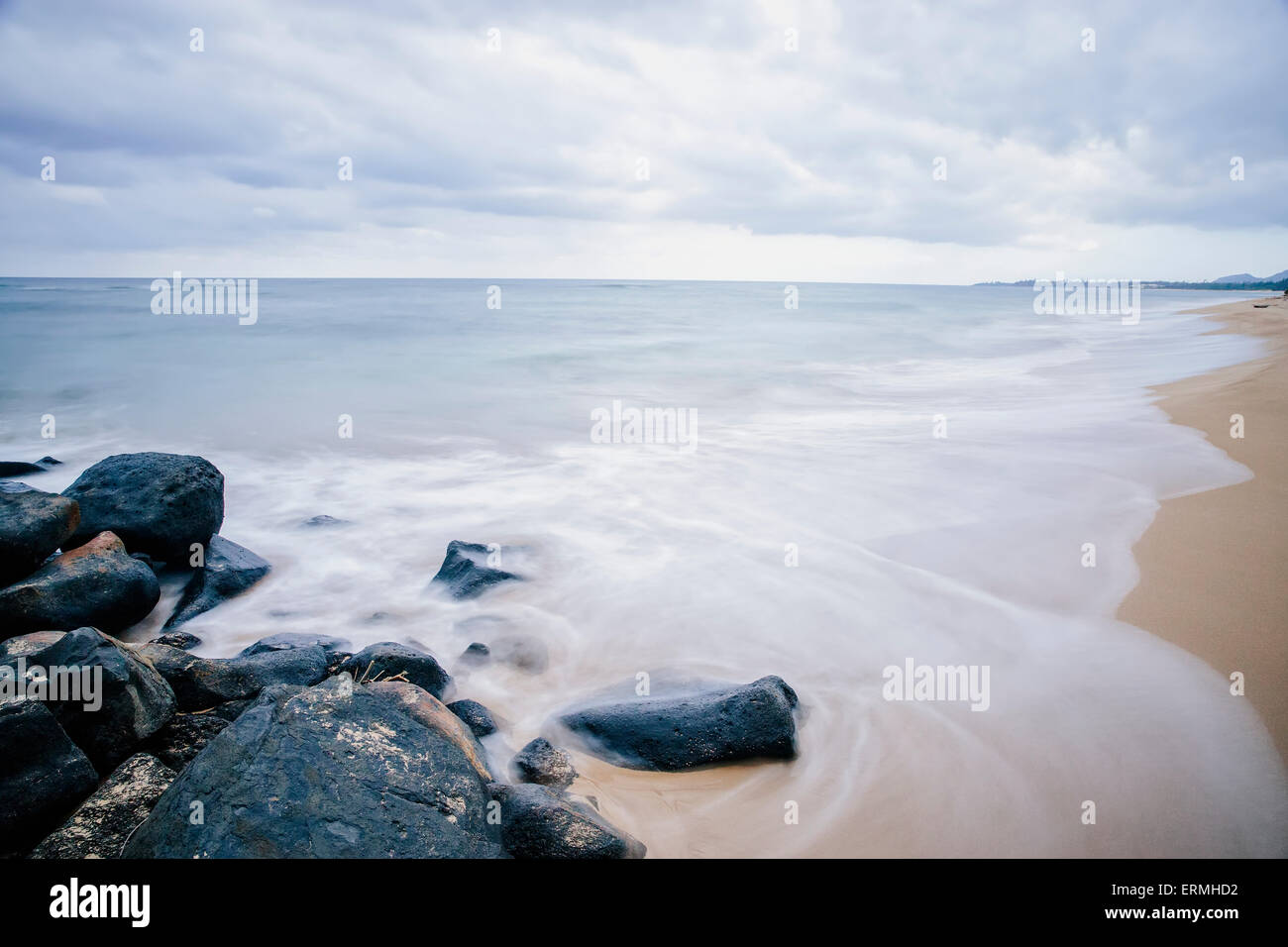 Surf washing up around rocks; Wailua, Kauai, Hawaii, United States of ...