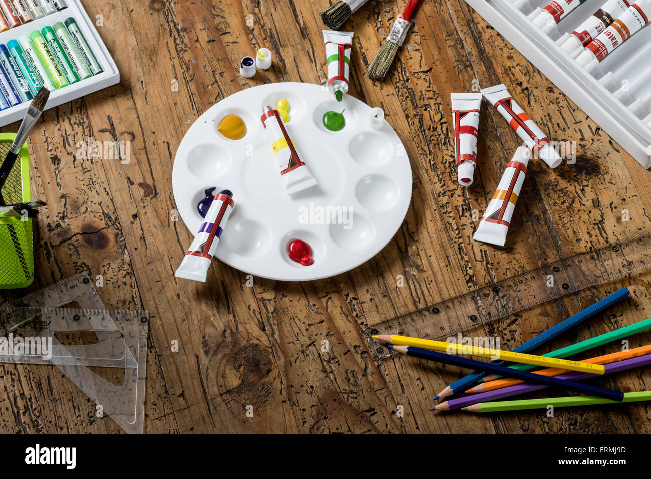 Artists creative work table Stock Photo - Alamy