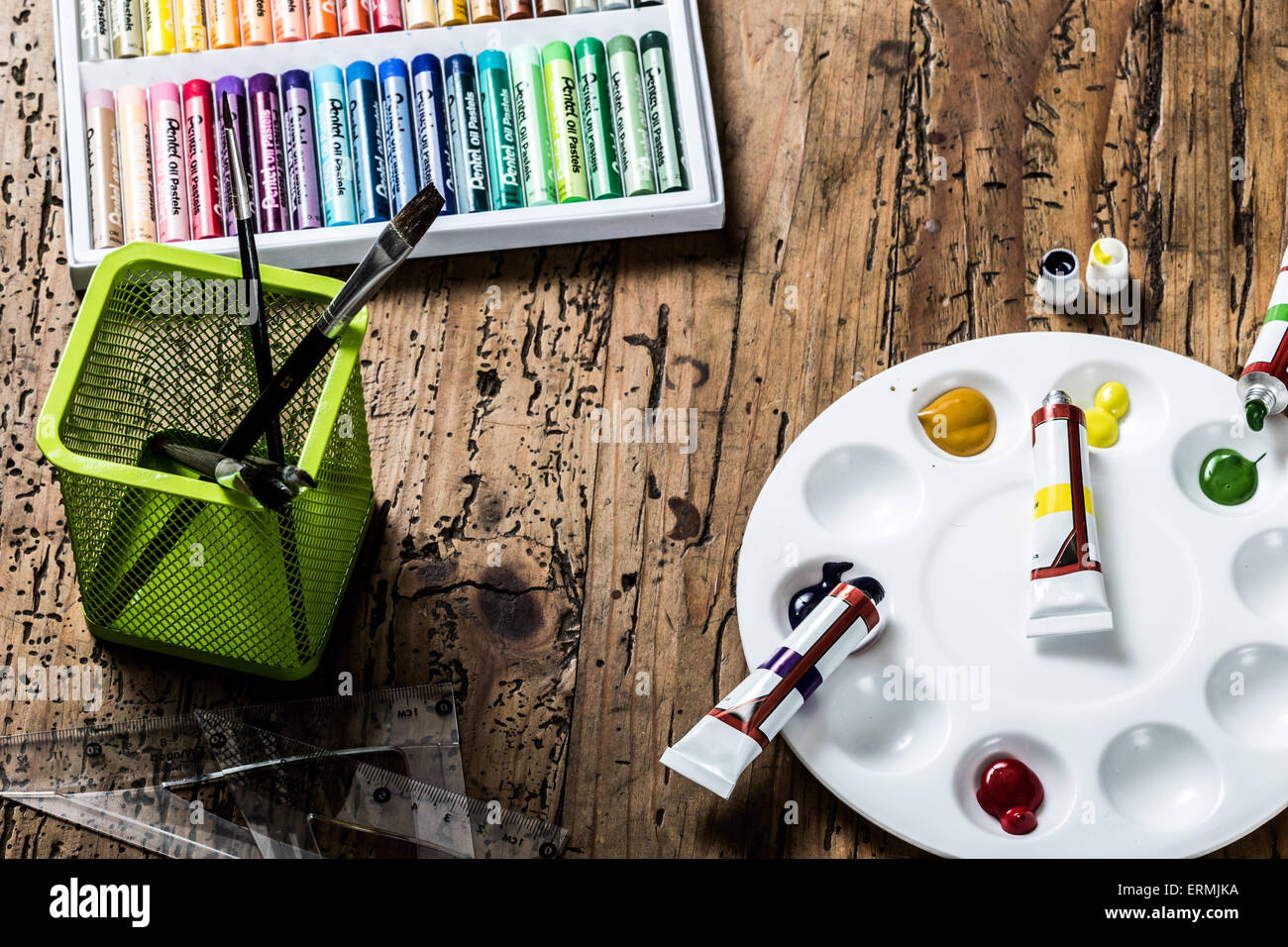 Artists creative work table Stock Photo - Alamy