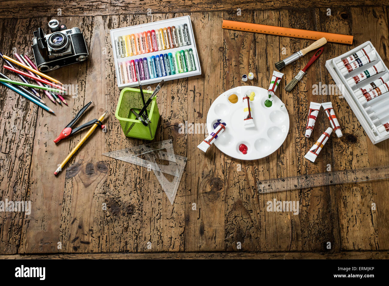 Artists creative work table Stock Photo - Alamy