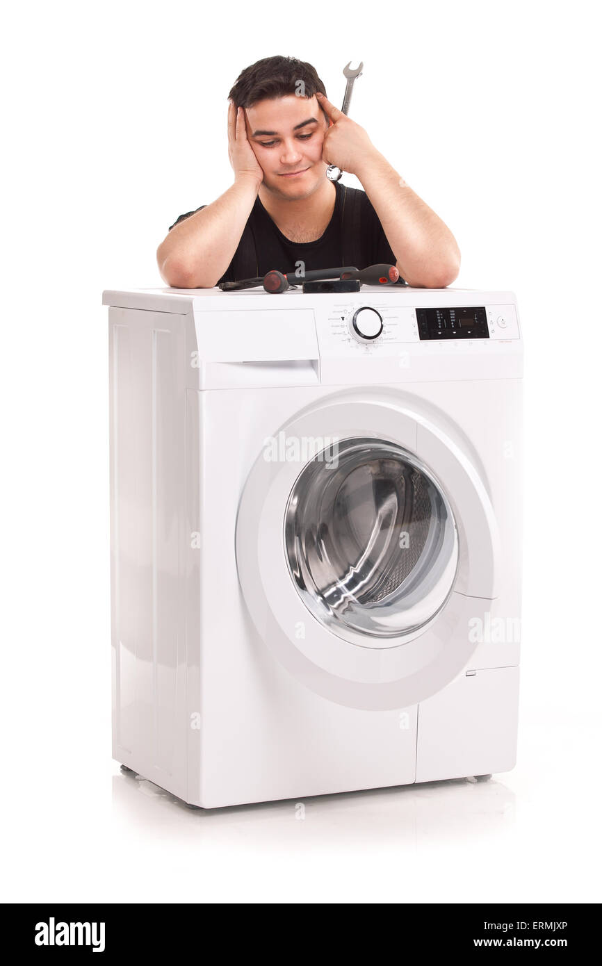 studio photo of washing machine repairman Stock Photo - Alamy